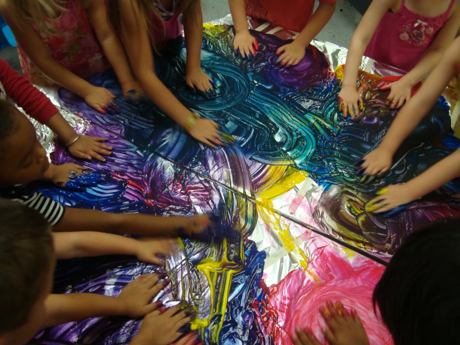 Joyful Learning in the Early Years: Finger Painting on Foil