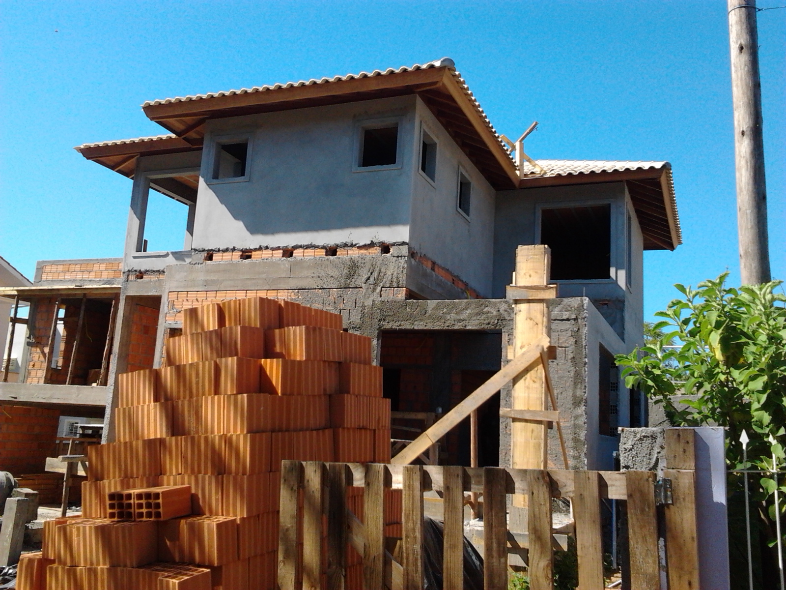 obra casa canela: 10 de dezembro - reboco externo pav. térreo