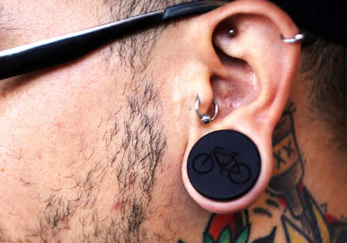 Gauging Ears With Extended Ear Piercings - Tattoos Body Piercings