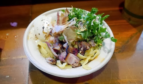 The bacon on top is fatty and nicely smoked. A poached egg and some ...