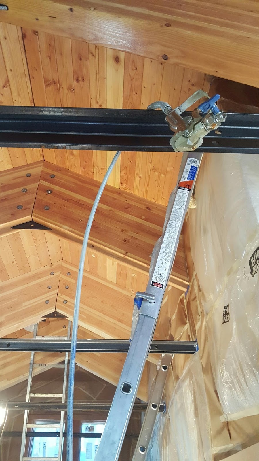 CCM Architecture : : Construction: Clear coating the car decking and beams