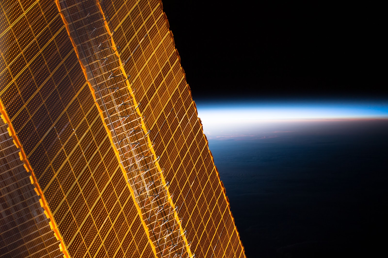 Earth and Solar Arrays of the International Space Station | Earth Blog