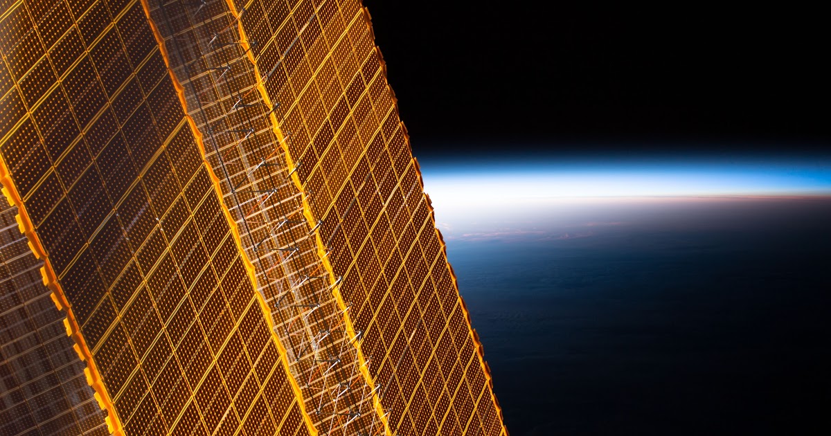Earth and Solar Arrays of the International Space Station | Earth Blog