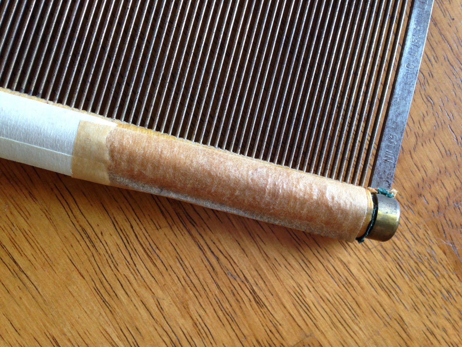 Daisy Hill Weaving Studio: Replacing the Paper on Weaving Reeds