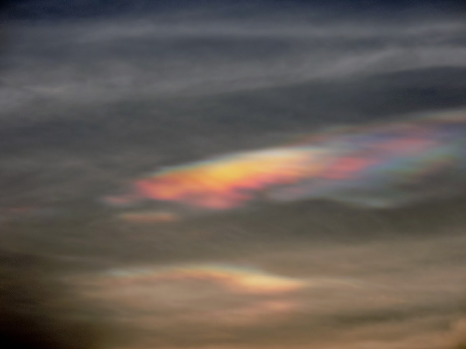 Musings: Scintillating luminous iridescent clouds.