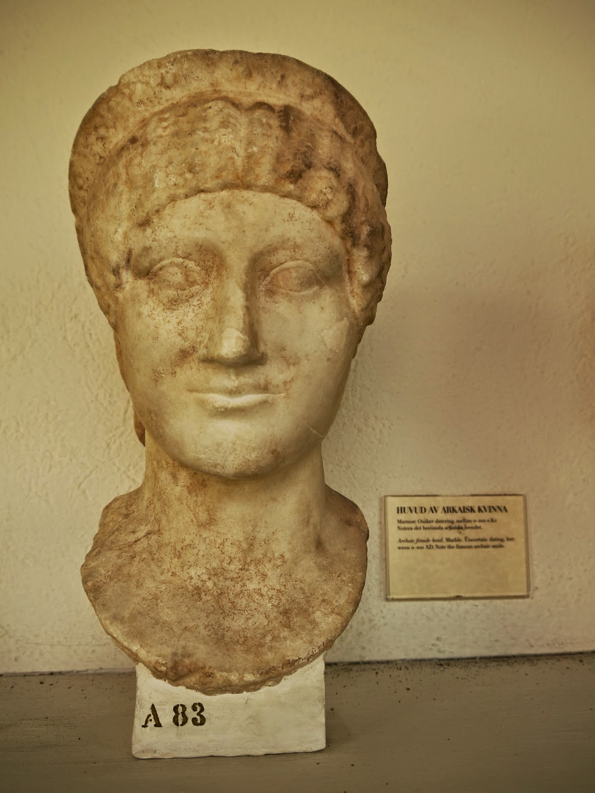 USEFUL or BEAUTIFUL: The archaic smile