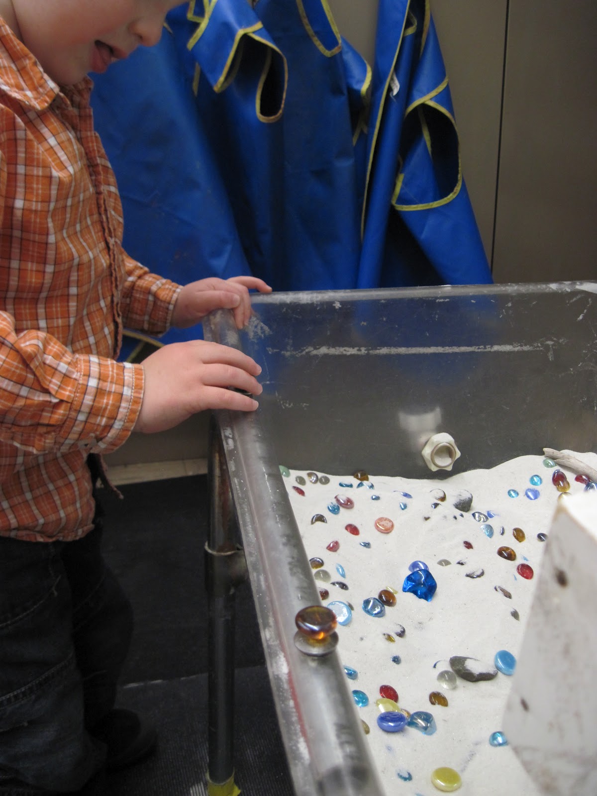 SAND AND WATER TABLES: GEMS, STICKS, AND STONES
