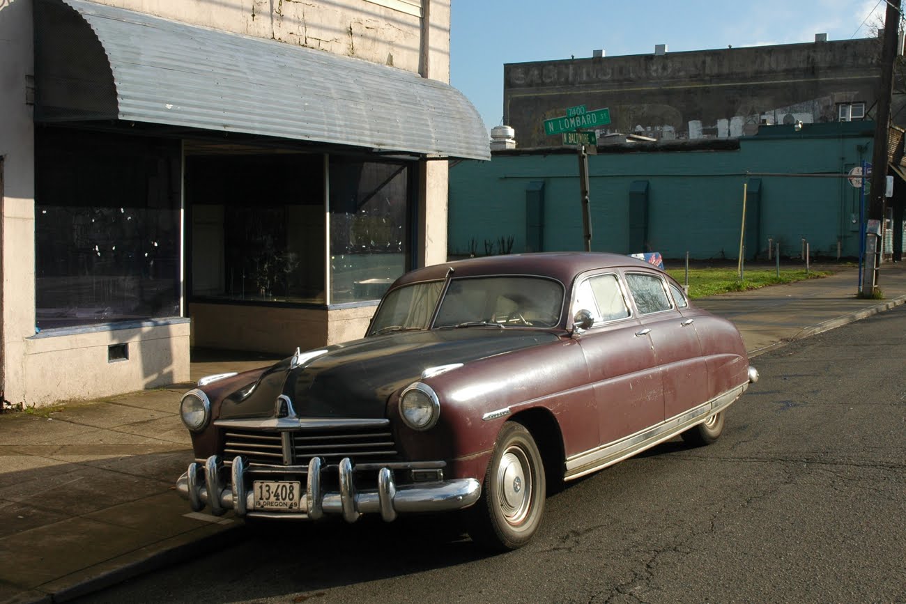 OLD PARKED CARS.: 1949 Hudson Commodore Sedan.