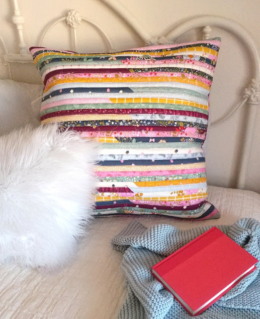 Sew this Simple and Luxurious Jelly Roll Pillow - Ameroonie Designs