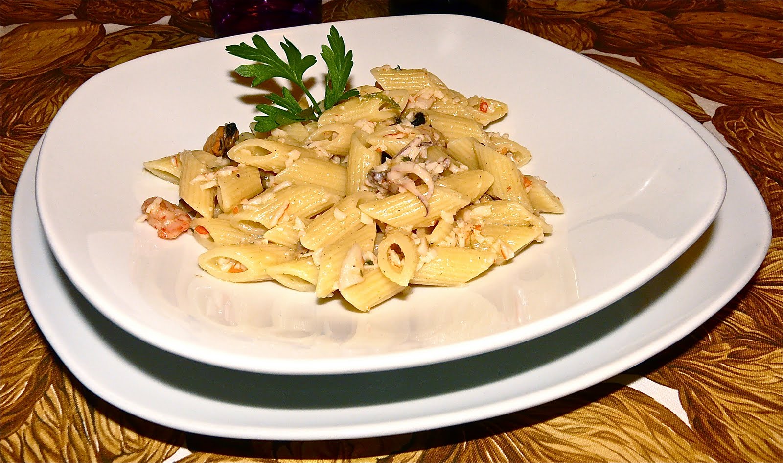 LA MERIGLIA AL POMODORO: Penne con misto di pesce