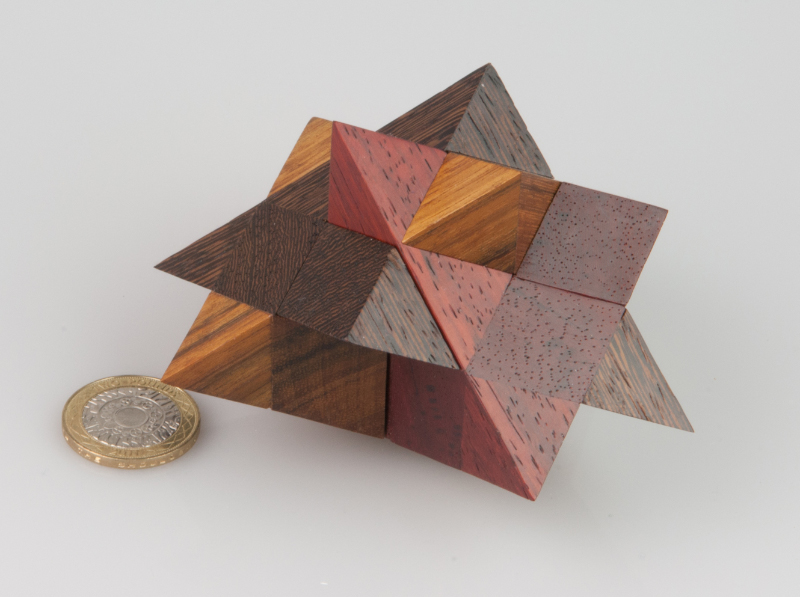 Puzzling Times: Toulouzas’ Triple Rhombic Pyramid