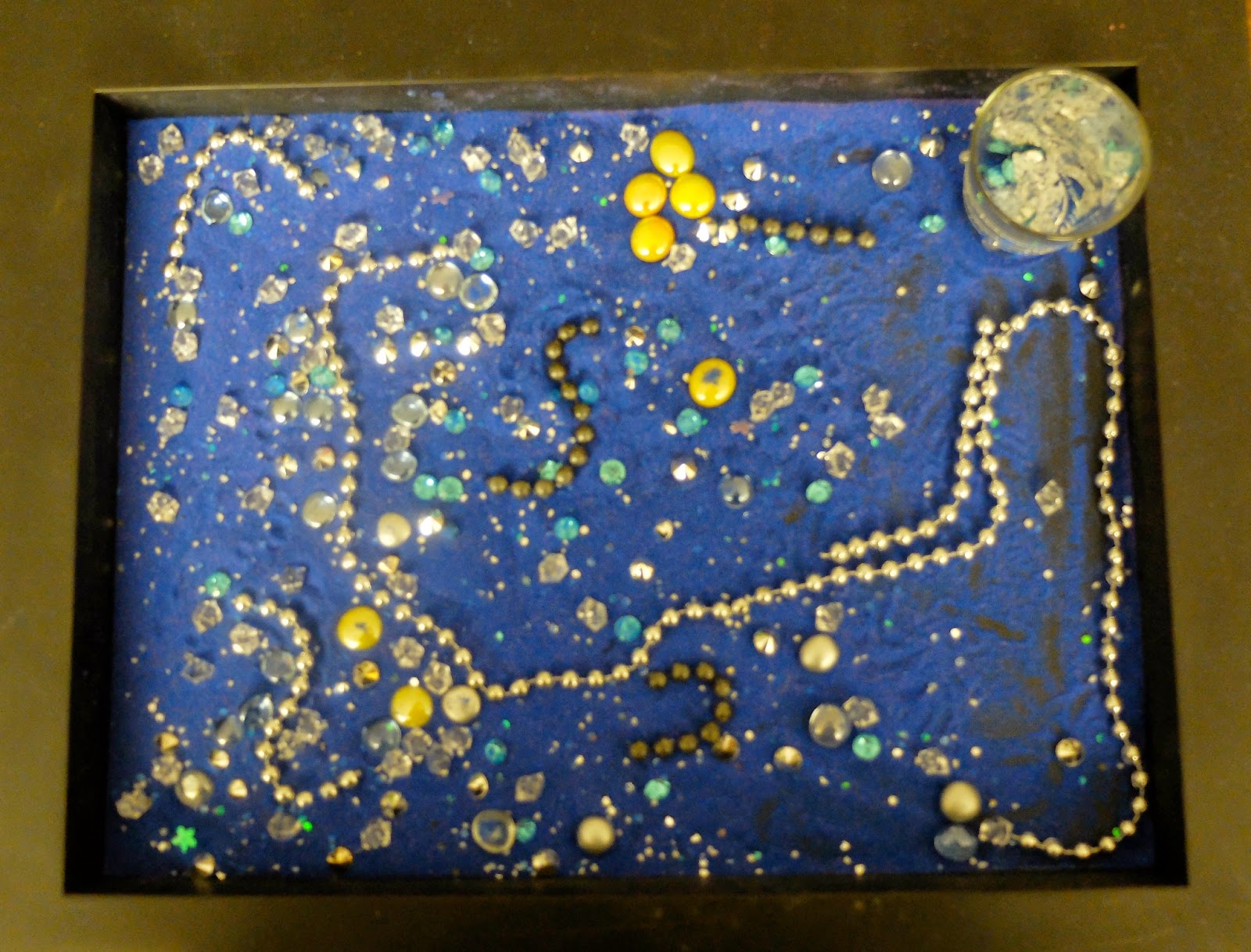 Starry Night sensory tray - rubber boots and elf shoes