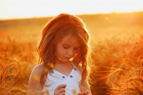 Very Cute and Beautiful Kid During Amazing Sunset