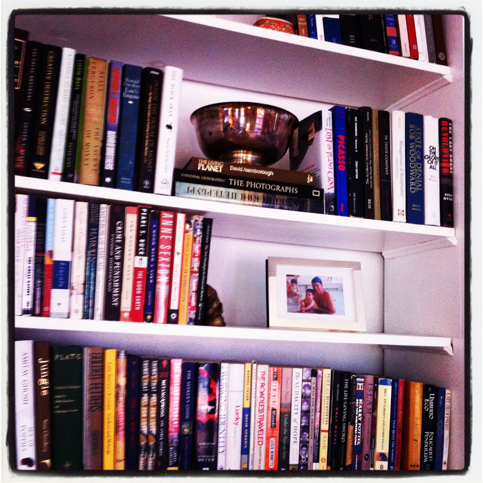 Return To Home: 4 Tips for Organizing and Styling a Bookshelf