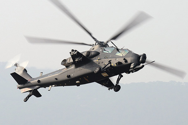 SNAFU!: Chinese helicopters now sporting air to air missiles.