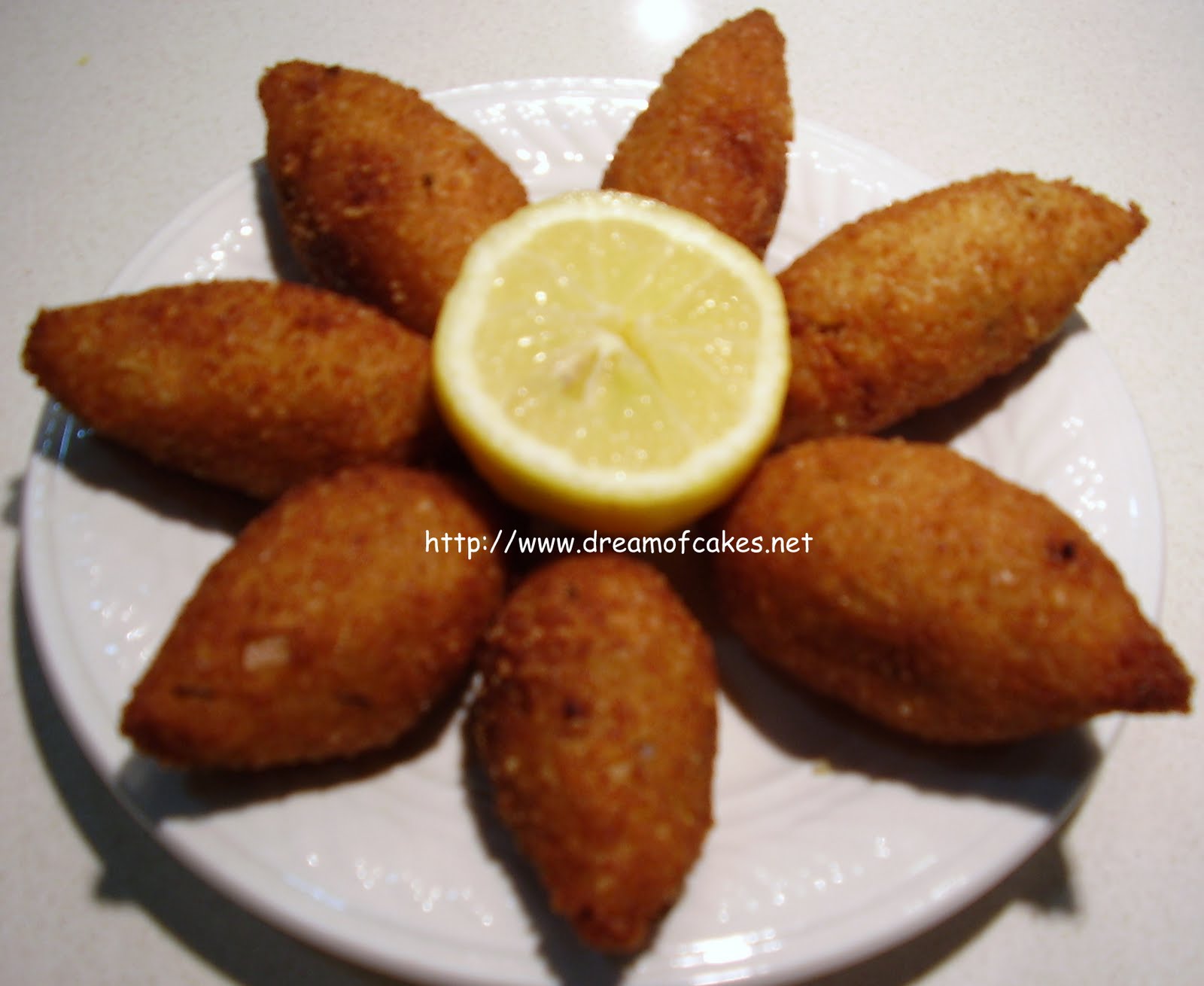 Koupes (Wheat bulgur filled with ground pork meat)