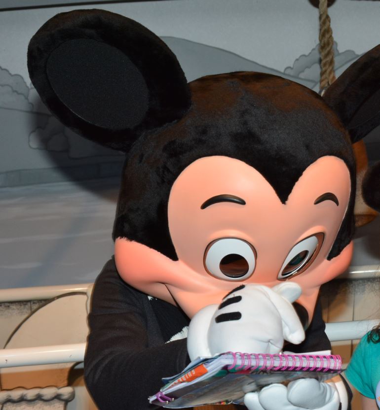 Disney character meetings and Autograph books