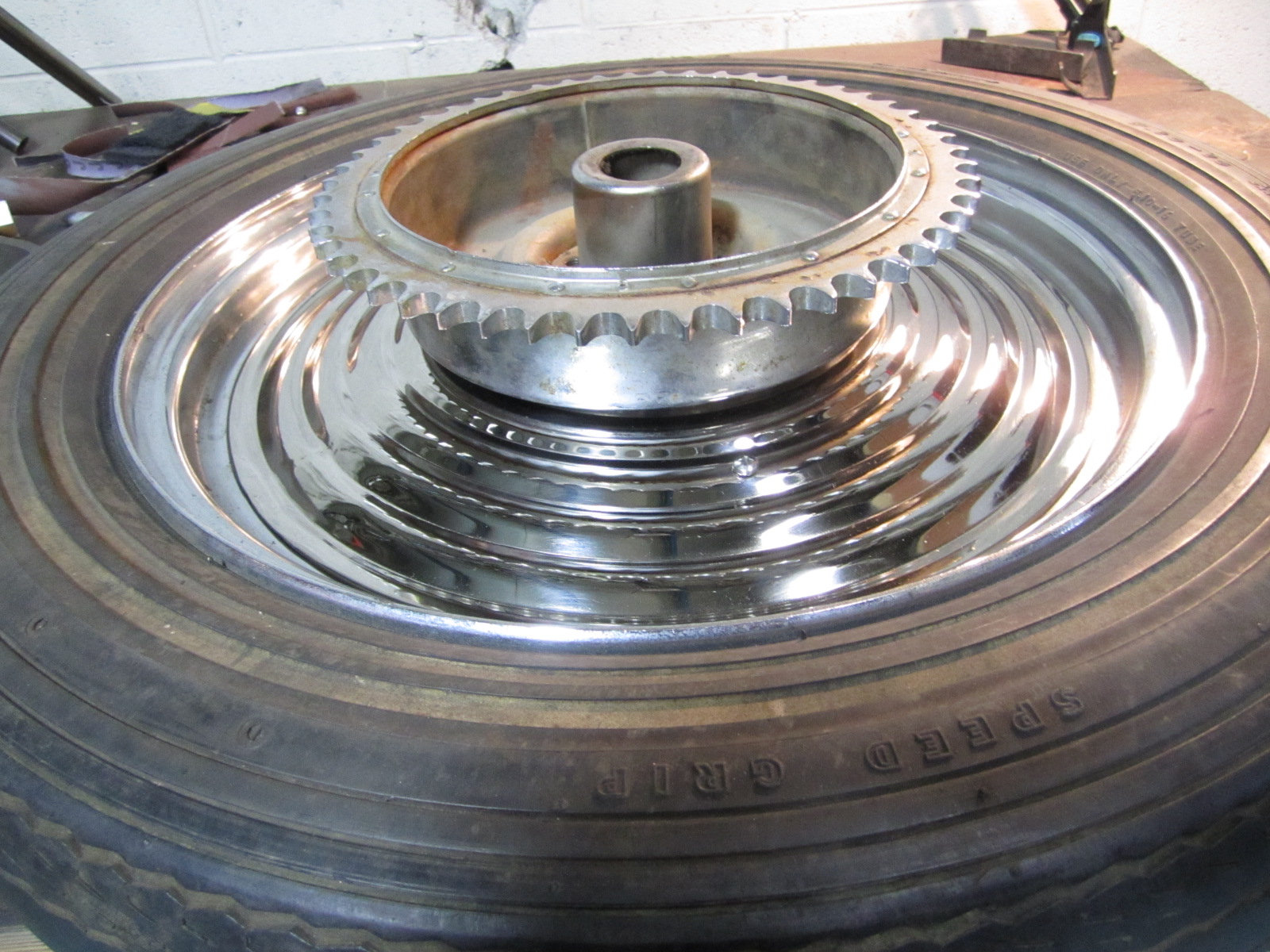 FRONT ST CYCLE: Ripple wheel covers. Fresh nickel plate