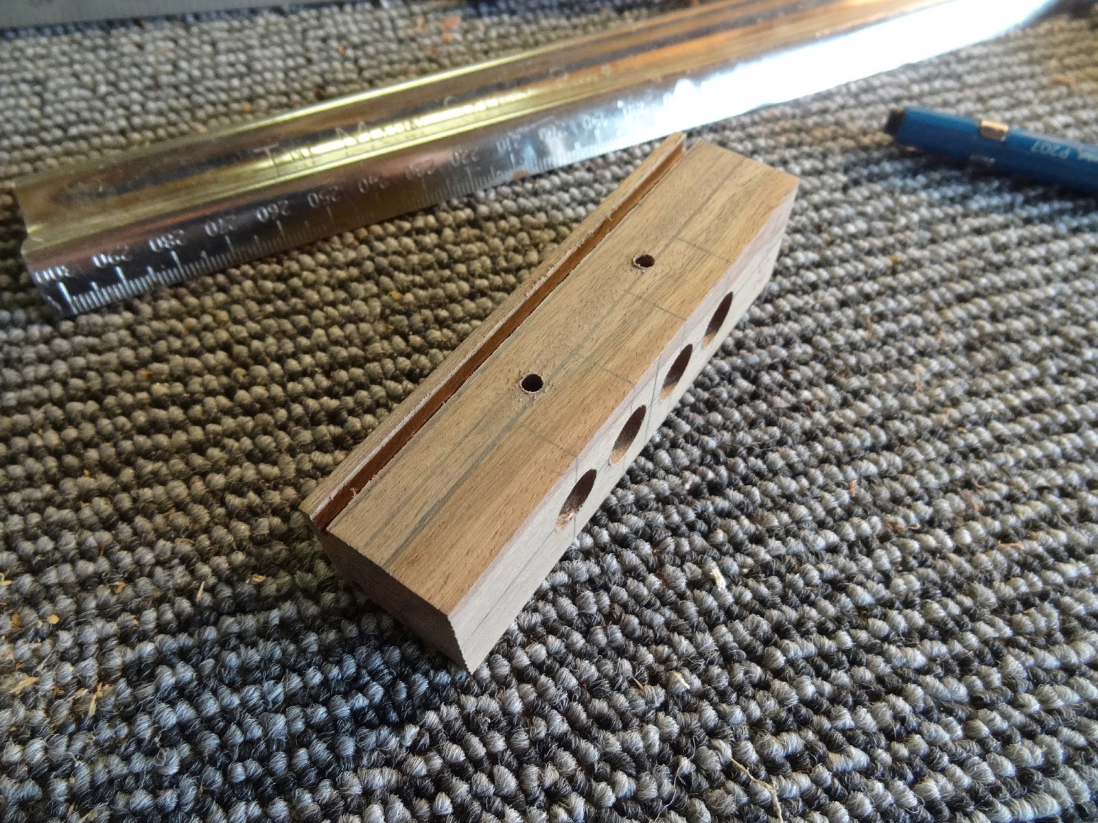 Shonky: How to make an easy string Ukulele Bridge.