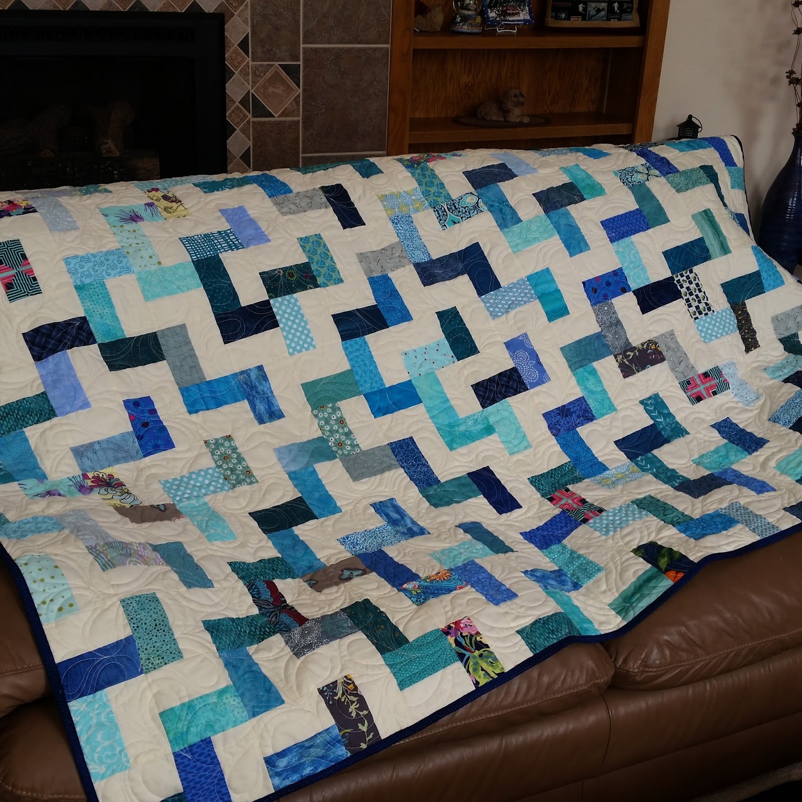 Mountain Quiltworks: My Blue Scrappy Quilt Is Already Loved!