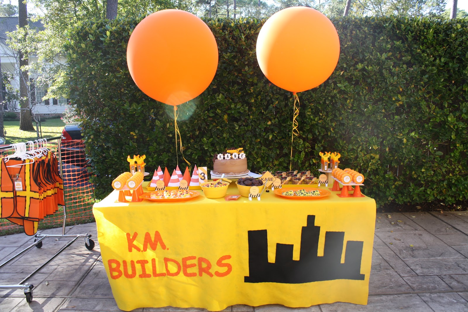 RAISING KANE: K.M. Builders (party details)