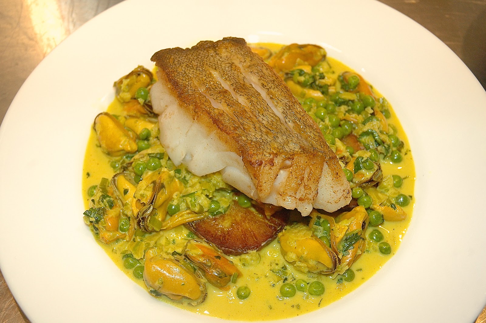 nueva cocina: Roast Cod, Curried Mussels, Sauté Potatoes