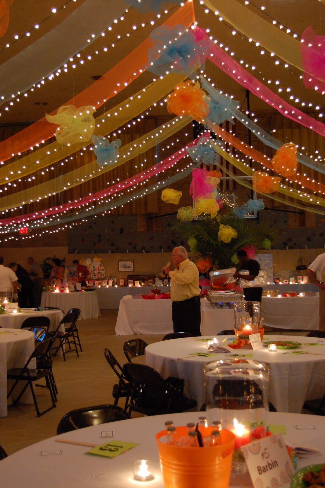 Party Ideas by Mardi Gras Outlet: Draped Deco Poly Mesh Ceiling Tutorial