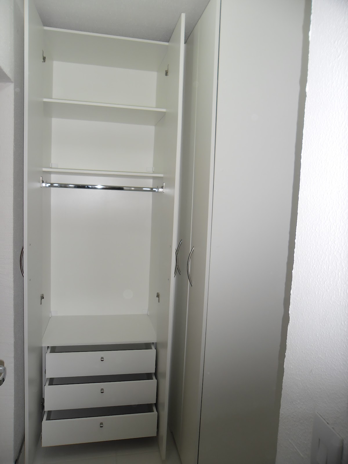 R&E Móveis Sob Medida: Roupeiro de Canto