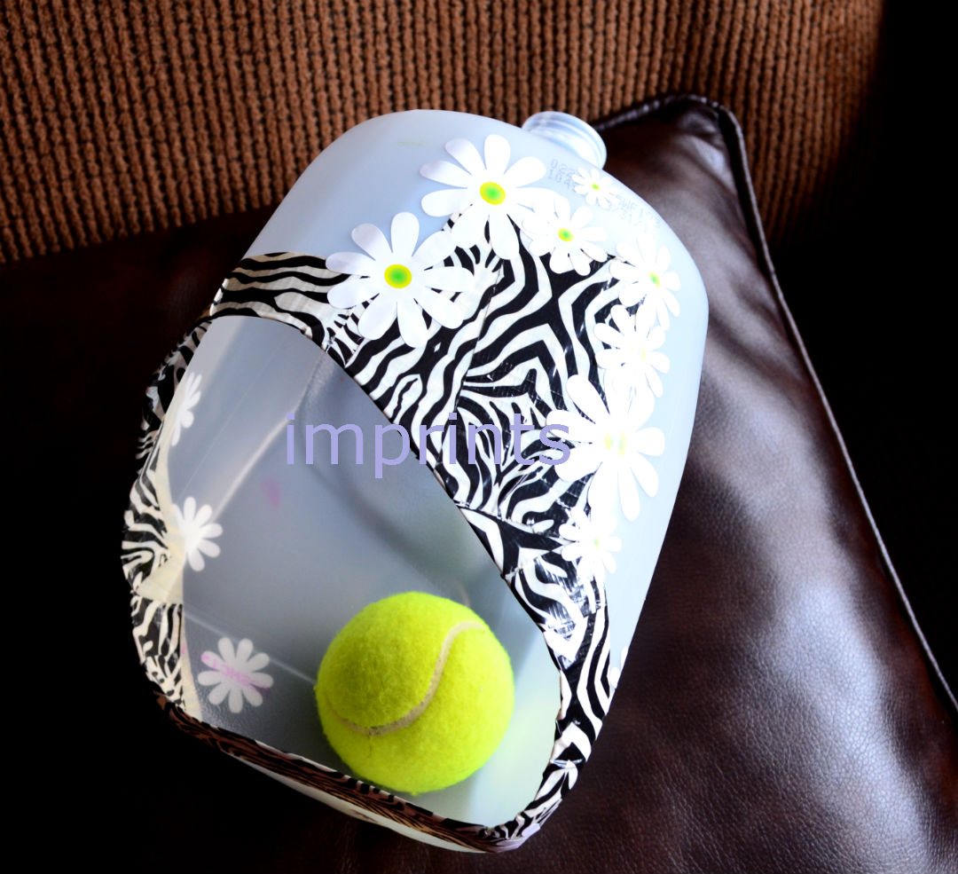 imprints handmade: Plastic water jug ball catcher: Repurpose