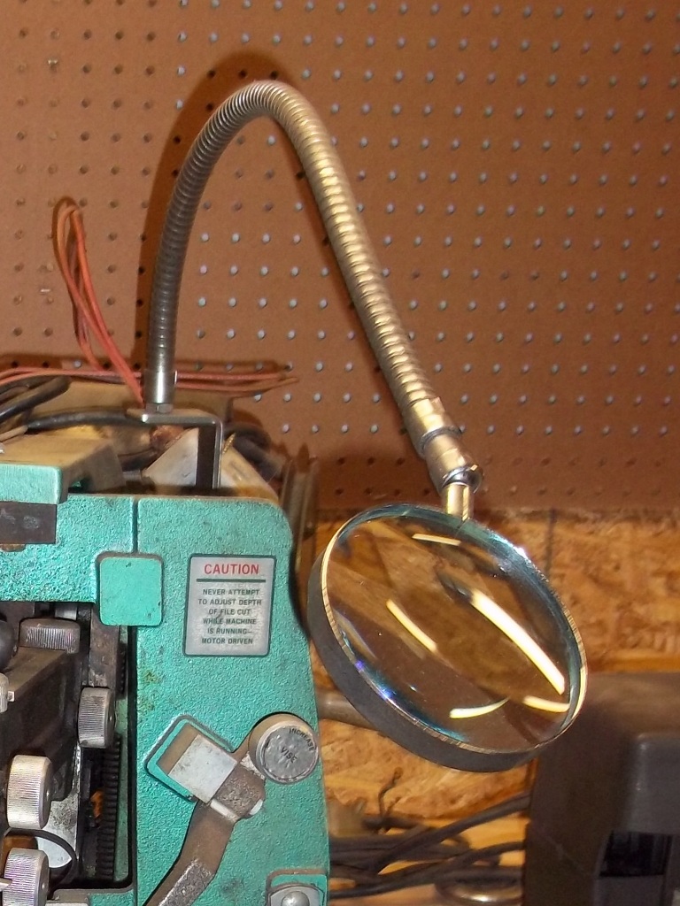 Foley Filer: Magnifying glass accessory on Foley Belsaw 387 filer