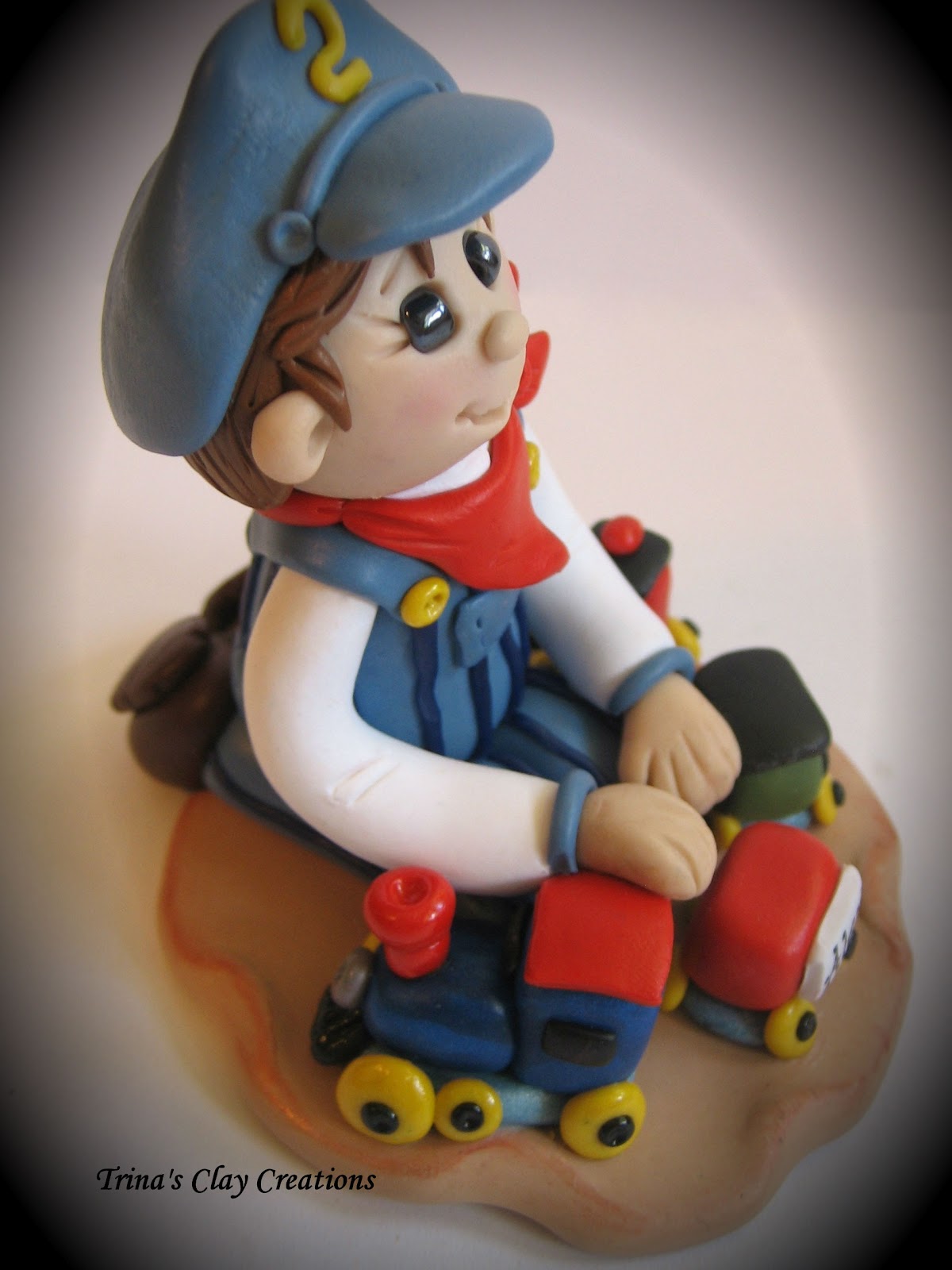 Trina's Trinketts: A Polymer Clay Train and Conductor