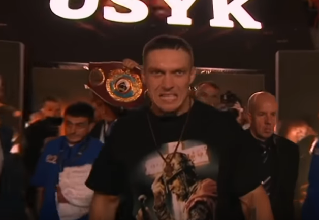 Muhammad Ali Trophy in hands of Christian fighter.