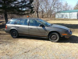 Going Postal: 2000 Saturn SWP RHD - DailyTurismo