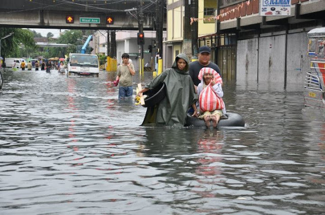 The rain, flood, damage, people stranded in photos and rescue scenes