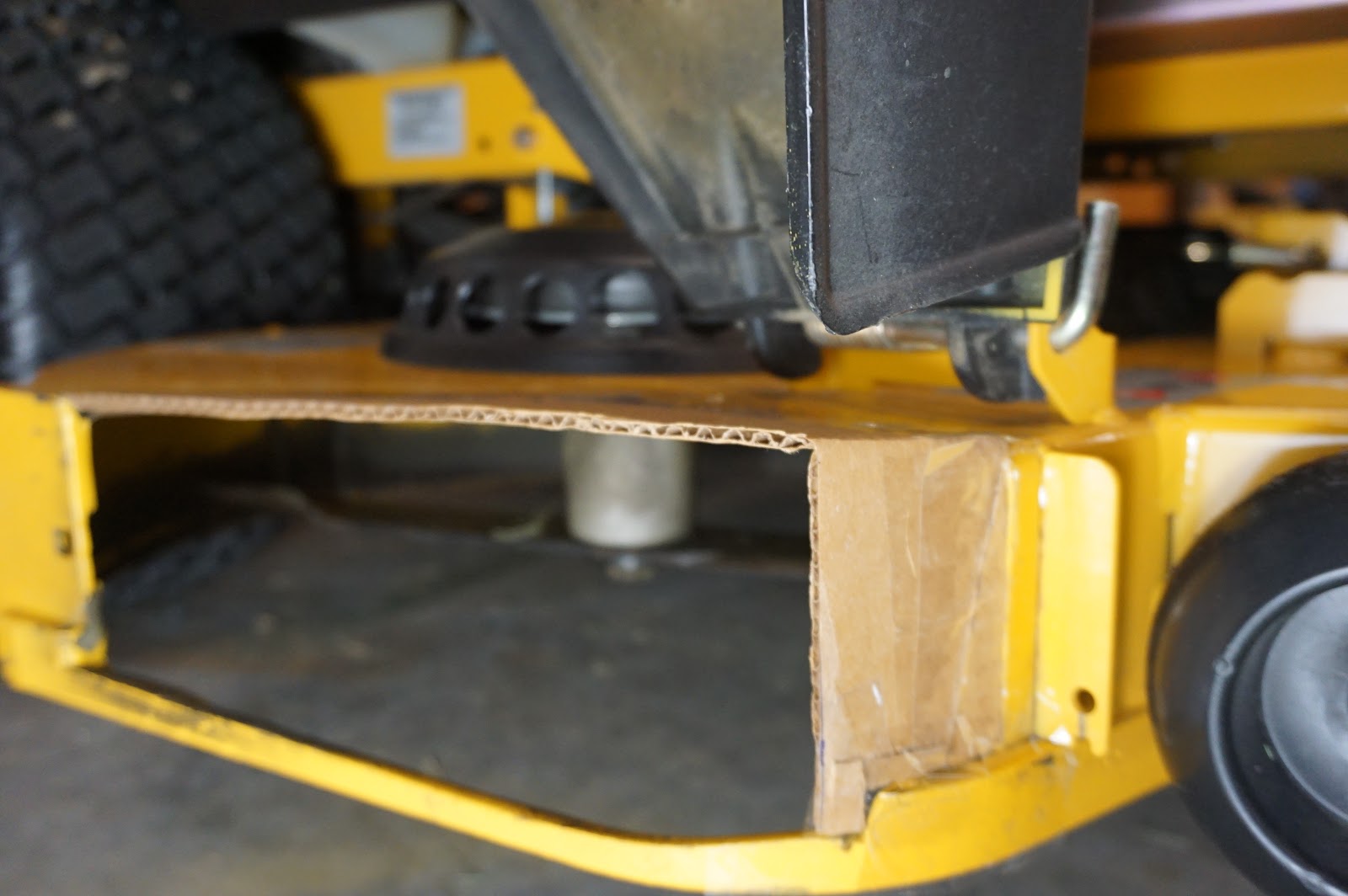 Big Dog Alpha / Hustler Raptor Deck Discharge Chute Modifications.