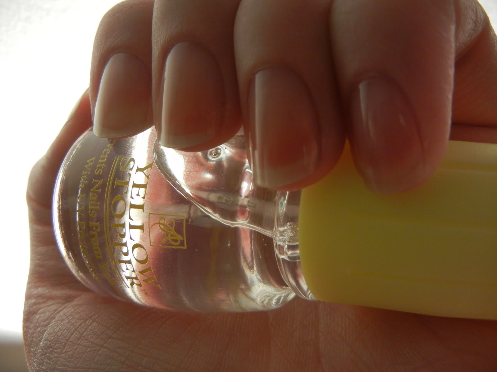 Thoughts of a Midwestern Girlie Girl: Yellow Stopper Base Coat