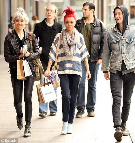 Off to the circus? Cher Lloyd clowns around with her red hair and ...