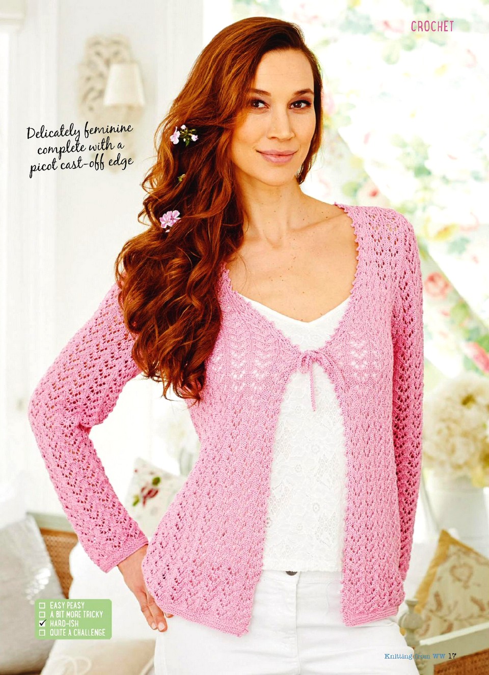 Irina: Pink lace cardigan.
