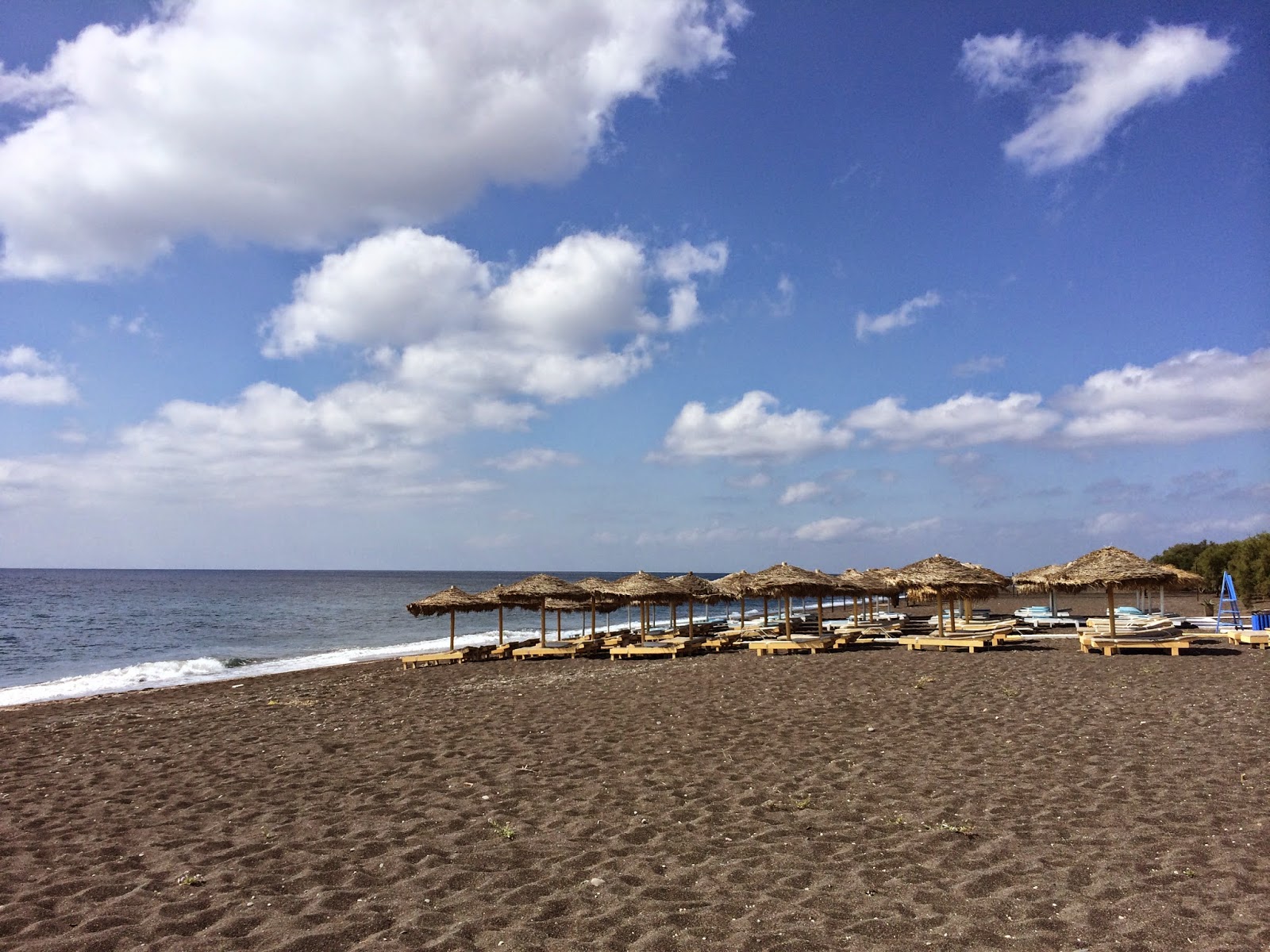 Perissa Beach (Black Sand Beach) - Santorini, Greece - Travel is my ...