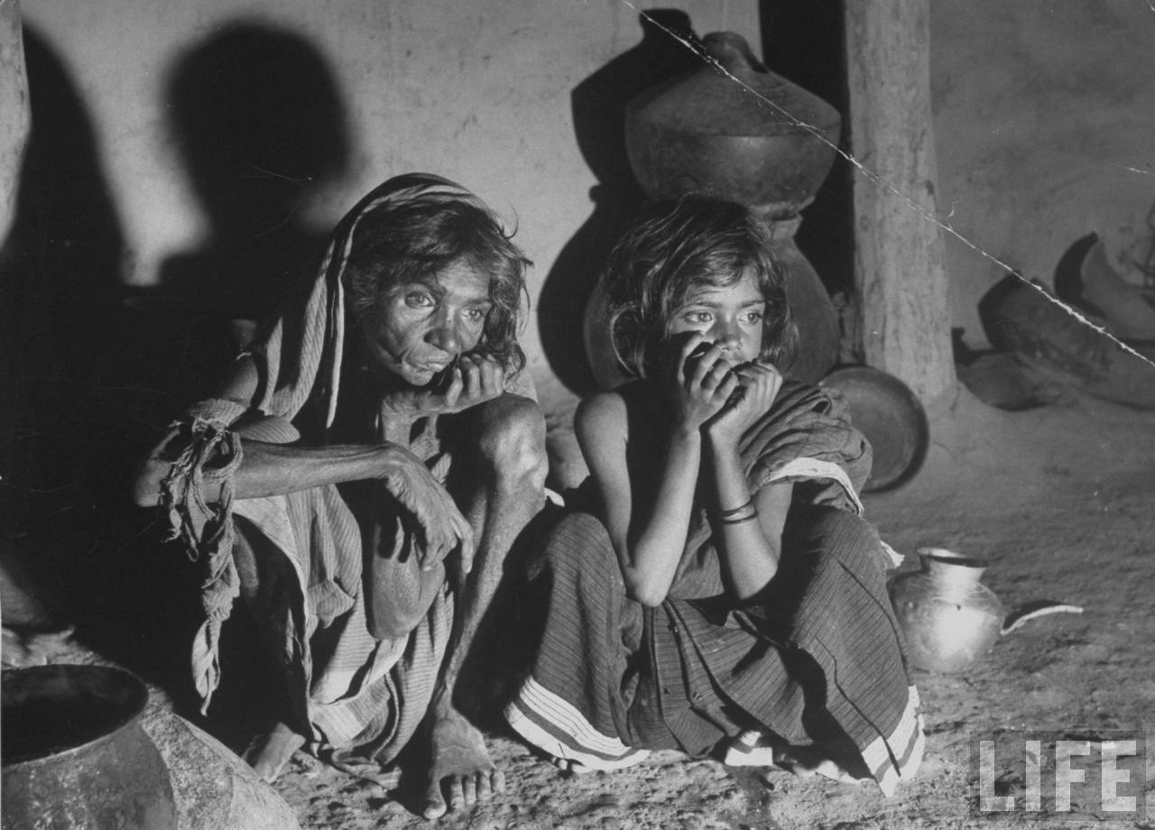 Starving Indian Peasant woman with her young Granddaughter, after ...