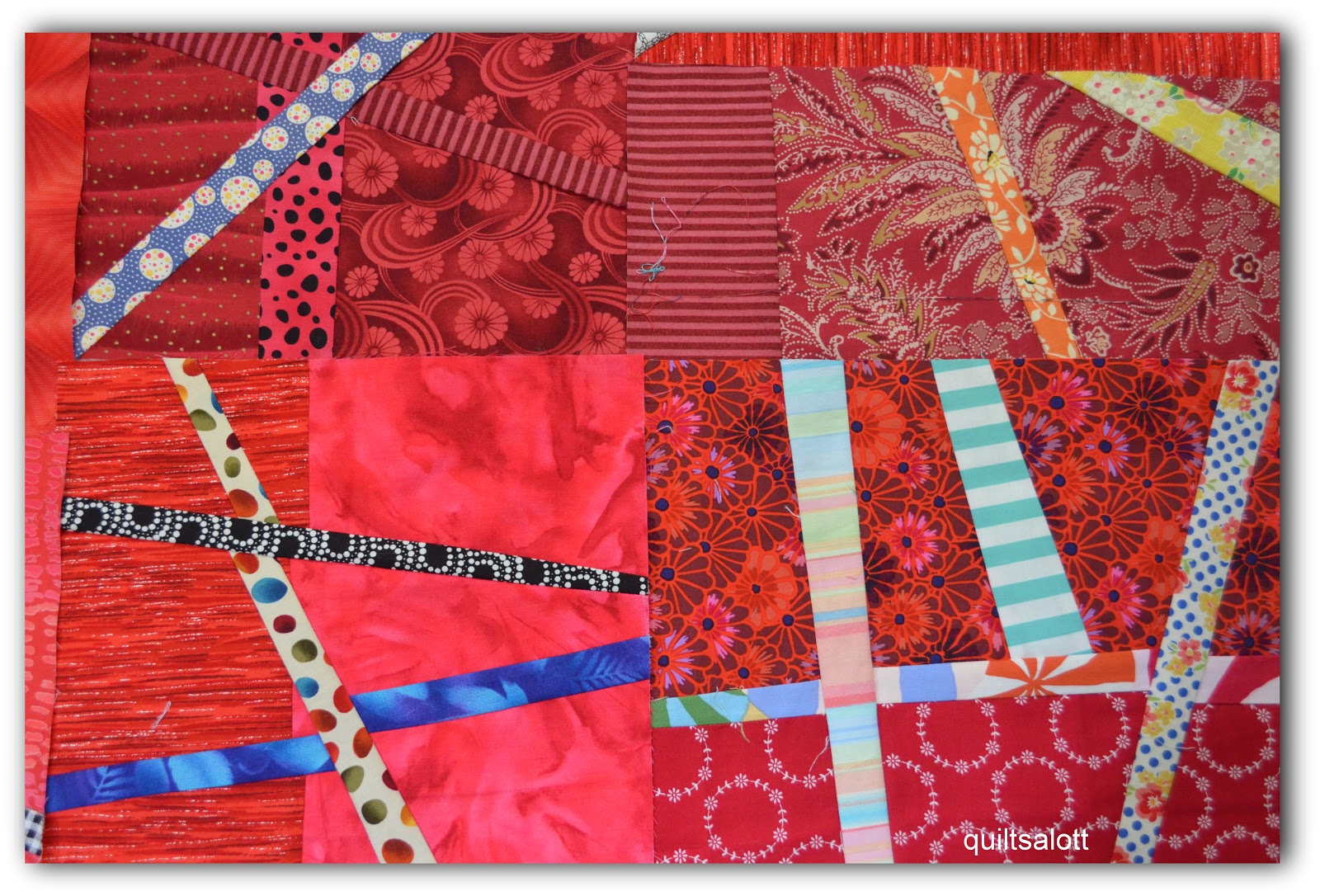 Quiltsalott: Take red fabric and add scraps