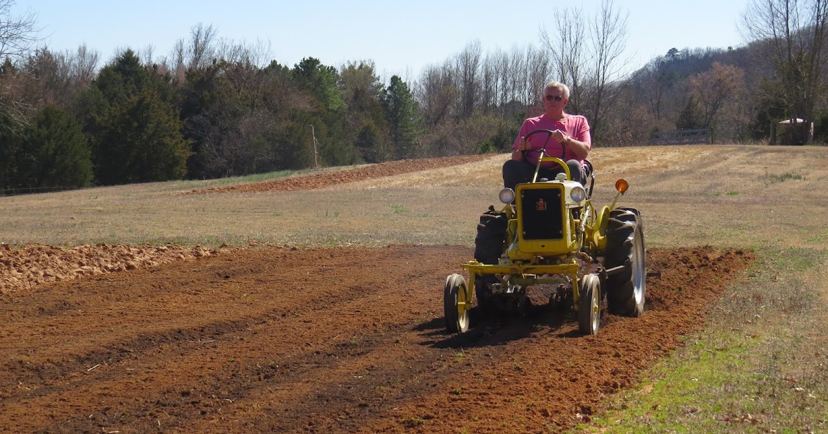 Farmall Cub Hub: Yellow Cub Laying Off Equal Rows