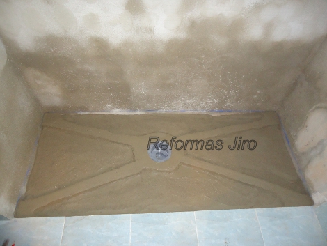 La base en ducha de obra