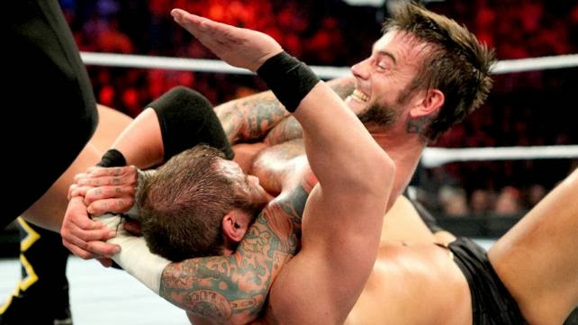 WWE In live!!!!: CM PUNK vs CURTIS AXEL & PAUL HEYMAN