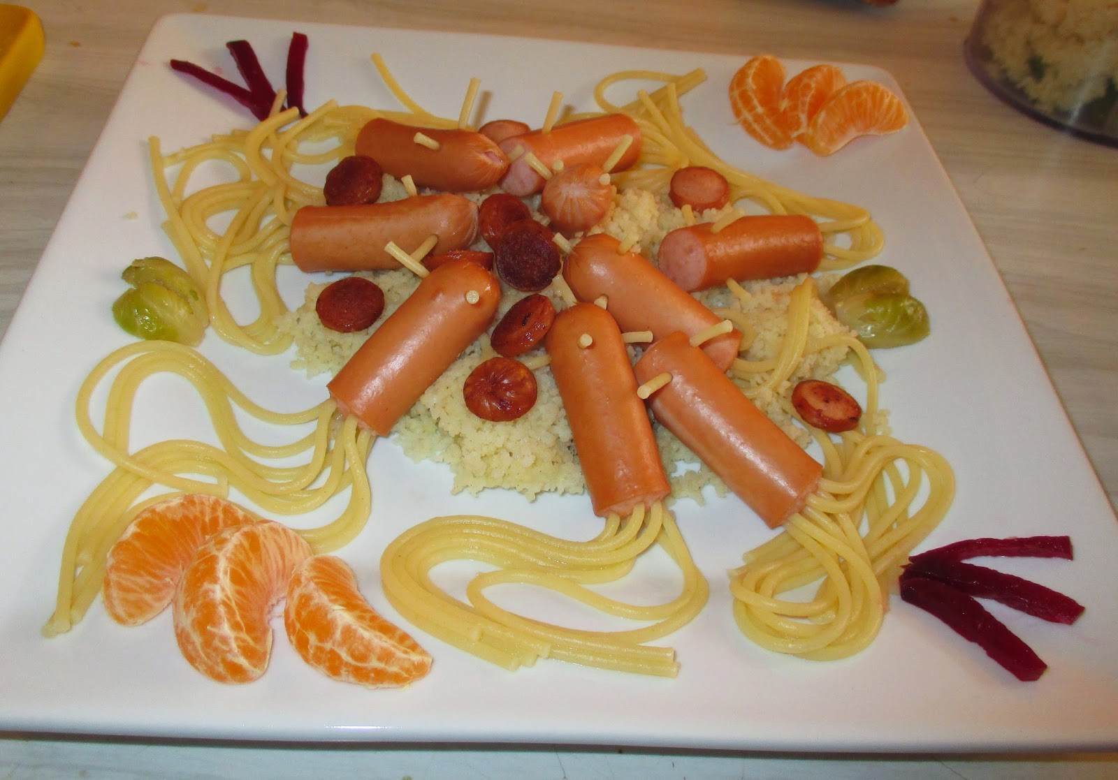 Fleur et Lumière: Carlo le calamar dans l'assiette de Lucie