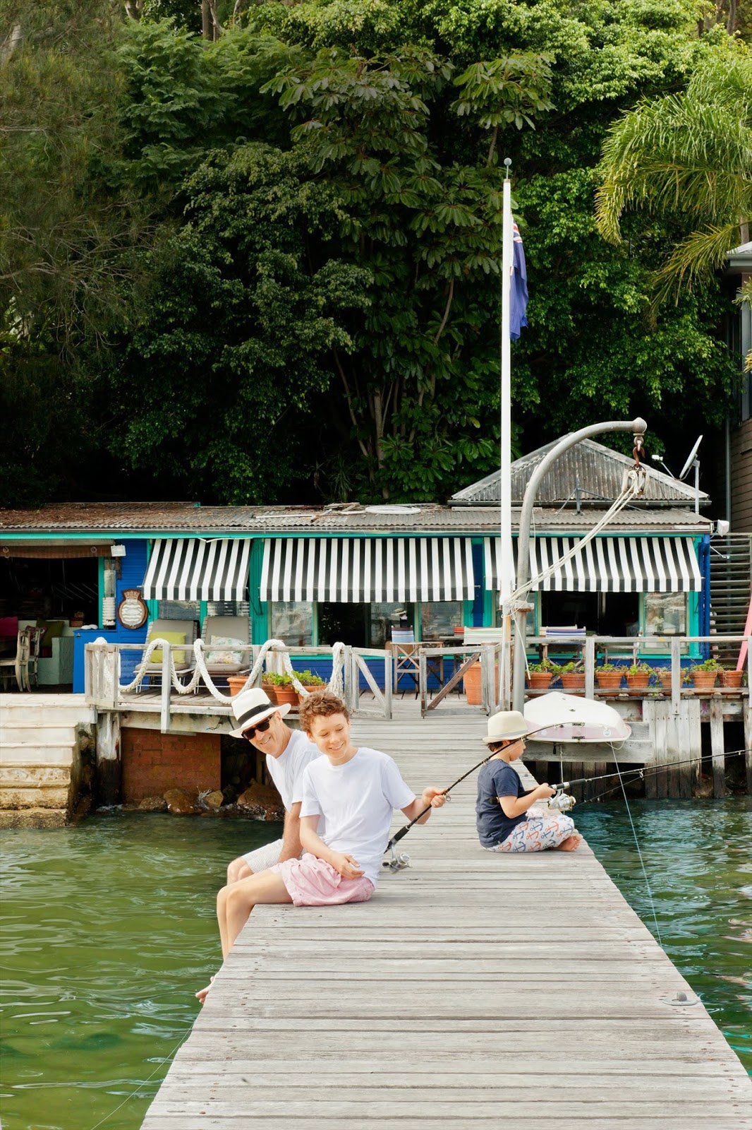 A colorful boathouse escape on the foreshore of Sydney's Pittwater
