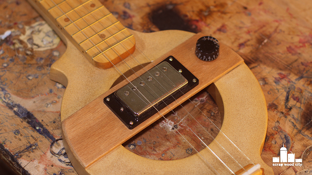 scrap wood city: How to make a DIY electric guitar from an old wall clock