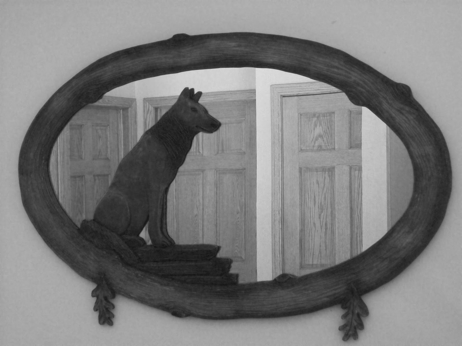 Sabella Custom Furniture: Carved Oval Wolf Mirror ~ $200
