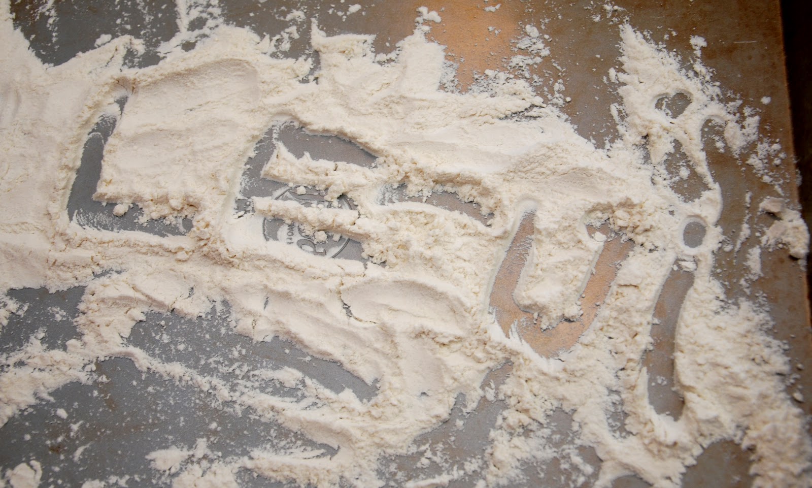 through mommy goggles: flour tray letters