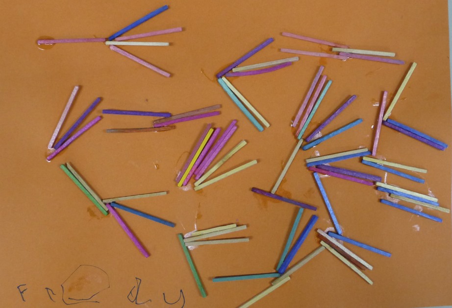 De Mello Teaching: Colored sticks on Cardboard